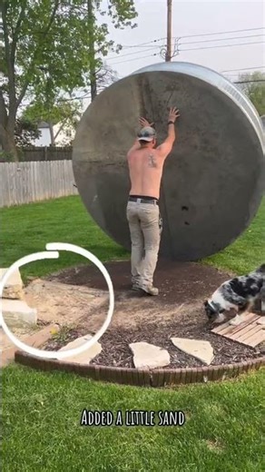 We laid out a measuring tape & cut the sides of the wood border around the fire pit area and laid it