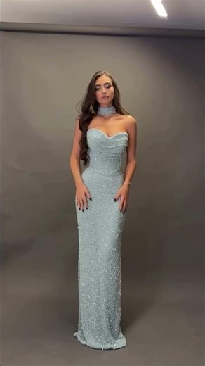 Share with a friend who would own the spotlight in this icy blue fitted gown! To order, send us a DM