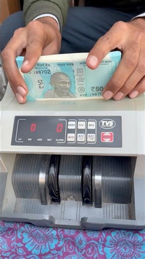 Counting 50-rupees cash 💵