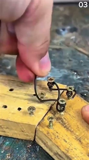 Simple spring jig technique for precision drilling in wood
