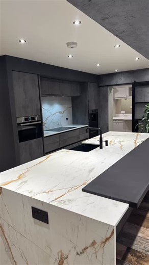 A recent installation for a returning customer, using Dekton Reverie worksurfaces with waterfall ends for a clean, flowing finish. Carefully detailed, from fabrication through to installation #Worktops #dekton #dektonreverie #bespokeinteriors #kitchen | EWS