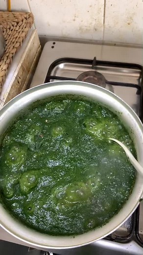 Herbal Cooking: Preparing a Flavorful Green Mixture