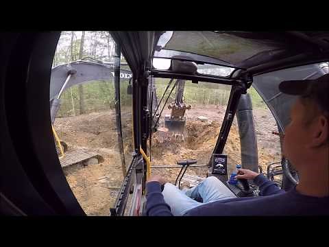 Excavators Pulling Out Stumps