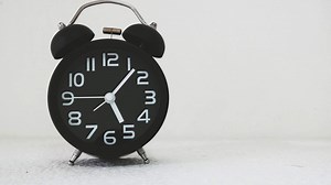 Retro Black Alarm Clock Showing Five Oclock Stock Footage SBV-352638724 - Storyblocks