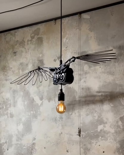 Gain insights into kinetic pendant lights featuring movable wings and skeletal bird forms. The mechanical structure adds motion and personality to interior spaces. | The Daily Digest