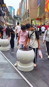 These are wireless public phone charging platforms in the City of Shenzhen, China. You can charge your phone while watching your favourite TV show. | Kasi Hustlers