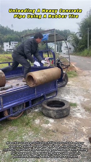 Unloading A Heavy Concrete Pipe Using A Rubber Tire
