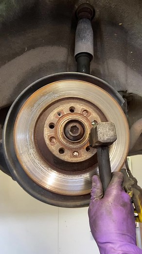 Inspecting Car Brake System: Rotor and Caliper Review