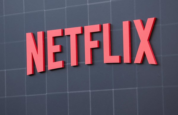 Netflix announces 10-for-1 stock split. Shares are gaining.