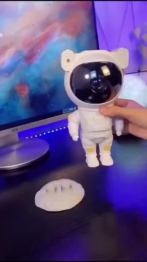 Transform your roomwith vibrant colors with the Astronaut Led Projector!