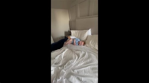 Exclusive- Tickle time turns tot into giggle machine- playful clip captures father-son joy