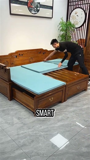 This wooden sofa can actually convert into a bed