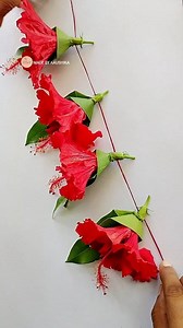 🪔✨ Diwali vibes in a few seconds! Handmade mango leaf & hibiscus toran 🌿🌺 Simple • Traditional • Festive 💛 #Diwali2025 #ToranMaking #Reels #MadeByKaushika #family #fblifestyle | Made by Kaushika