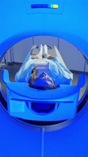 clip-4006513865-women-patient-on-ct-mri-scanner-woman