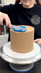 The amazing 🌈 @colour.mill cake scraper and ✨“Over The Top” Blue Frosting which I absolutely adore and MASSIVELY recommend. It’s so smooth and easy to use. 📌Both available at The Cake Decorating Company #buttercreamcake #smoothbuttercream #smoothbuttercreamcake #buttercreamcakedesign #cakedecorating | Jinny's Cakes Bakes & Decorates