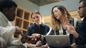 Diverse People in an Office Talking and Agreeing While Pointing at Tablet Screen. Multiethnic Startup Management Board Deciding on Changes for the Next Quarter. Close up Slow Motion Shot