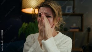 Crying woman shouting, portrait of screaming female person in living room, feeling anger and stress, bad mood. Family problems, aggressive emotional wife quarreling.