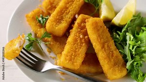 Fried Fish Sticks with Lemon and Salad – Crispy and Delicious Meal