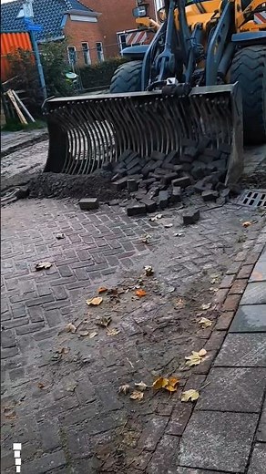 Powerful Wheel Loader with Skeleton Bucket Removing Paving Blocks – Street Construction Process 2025