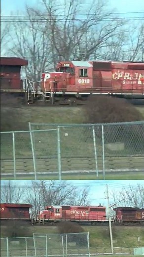 RARE Dual Flag CP SD40-2 Westbound on Elevated Tracks.