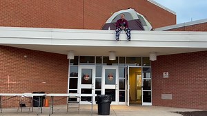 Donald E. Schick Elementary Principal Marc Walter spent the night in a tent on the roof of the Loyalsock Township School on Thursday, after the students met the challenge of raising over $50,000 "Sock Walk" PTO fundraiser. Schick Elementary PTO | Williamsport Sun-Gazette