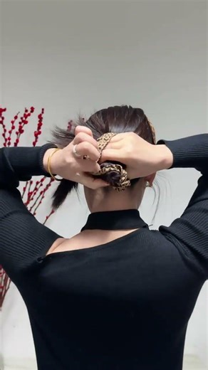 Unleash Your Wild Side with This Trendy Leopard Print Hair Tie