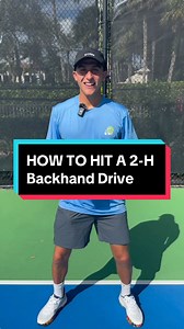 How to hit a two handed backhand drive! ✋✋ 🚙 1️⃣ Grip the paddle with your finger on the back. 2️⃣ Step into the shot, using your shoulders and hips to generate power. 3️⃣ Extend arms on contact, don’t whip them. 4️⃣ Get your legs under the ball. #pickleball #pickleballaddiction #pickleballislife #pickleballrocks #pickleballaddict #pickleballtournament | Tanner.Pickleball