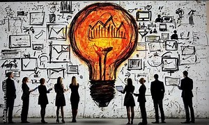 A group of people are standing in front of a wall with a large light bulb drawing. The drawing is surrounded by various shapes and lines, and the people are looking at it