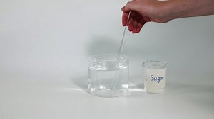 clip-1111516889---observing-process-sugar-dissolving-water
