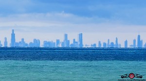 From Michigan City Beach to the Chicago skyline in one shot. Just testing out the camera zoom while flying the drone. Check out the drone! DJI Mavic 4 Pro: https://amzn.to/48YDn8Q | Timeless Aerial Photography
