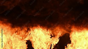 Big real fire of gas and oil explosion bursting through air.The building was burnt down.infernal fire in an industrial factory with big flame and smoke. Looping Fire Flames. Fire wall in slow motion