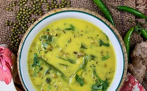Gujarati Khatta Mag/Moong Recipe is a delicious recipe of protein-packed green moong beans in a khatta buttermilk curry as the name suggests. A classic in Gujarati households, it goes best with some steamed rice. the addition of fresh coriander leaves instantly lifts up the dish. Recipe Link - https://www.archanaskitchen.com/khatta-mag-moong-green-mung-beans-in-buttermilk-curry #AkSSP | Archana's Kitchen