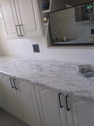 Wrapping Kitchen Worktops With Marble. #kitchenwrapmasters #cabinetwrap #fridgewrap