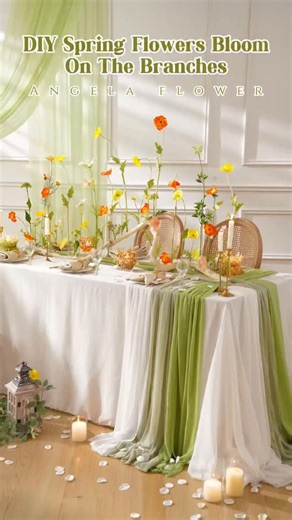 Angela Flower on Instagram: "DIY Magic Alert - Centerpiece Floral Tutorial🌟 This whimsical floral centerpiece instantly transforms your table into a springtime dream! Soft whites and fresh greens accent warm orange blooms, paired with flowing tulle—cozy and inviting, easy to recreate (even if you‘re not a crafting pro). Who wants to replicate this vibe?👇 pls follow us , we will give special discount to new fans！ From : @angelaflowerofficial angelaflowerofficial, Flowers for designers! https://