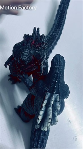 Chin Godzilla vs normal Godzilla