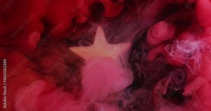 Explosion cloud. Paint splash. Pink red color ink water drop vapor revealing star on dark black abstract art background.
