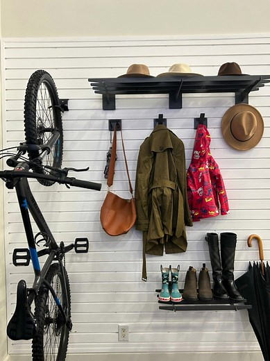 Garage slatwall made for a rainy day ☔️🌧️ Transform your garage wall with our slatwall and LINEA accessories! Each accessory comes with a locking clip to keep items securely in place, while also allowing you to adjust placement as your storage needs change. #slatwall #garage #transformation #stopmotion #rain #springshowers #organizedhome #organizingtiktok #organization