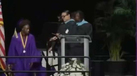 Watch: Celebrating student accidentally kicks girl in the face doing backflip at graduation ceremony