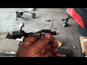 Installing the ignition cylinder lock clip, use the end of the shift lock cable. - VOTD