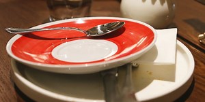 I Asked 3 Restaurant Pros If You Should Stack Your Plates After Eating—Their Answer Was Clear