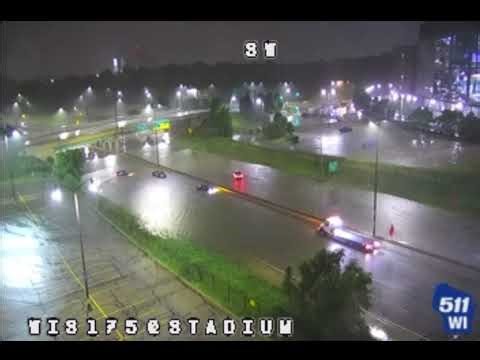 Cars stranded near Stadium Interchange during historic flooding