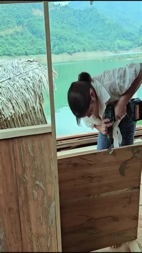 Floating House with Wooden Walls and Doors