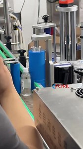 Liquid filling line - four head filling capping circular bottle positioning labeling small plastic bottles | Henan Cyril Machinery Equipment Co.,LTD