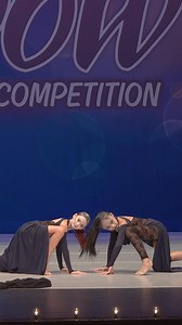 Giving chills! 👀🖤 This contemporary duet "Never Alone" from @pure_movement_dance had us on the edge of our seats from the very first jump! With hauntingly beautiful movement and a spooky aesthetic, these dancers told a story that hit deep. 🖤✨ Who else felt the goosebumps? Drop a 🖤 if you did! 🎥 Watch the full routine now on our YouTube channel! #rainbowcomp #DancerLife #DanceReels #SlayTheStage #CompetitionSeason #ContemporaryMagic | Rainbow Dance Competition