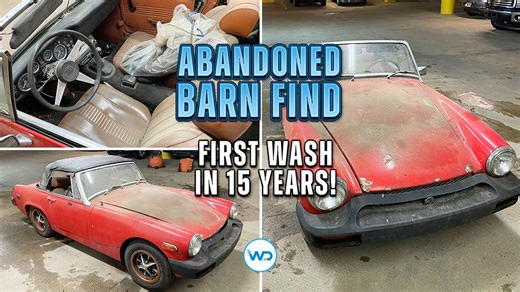 Abandoned MG Midget receives first wash after fifteen years sitting