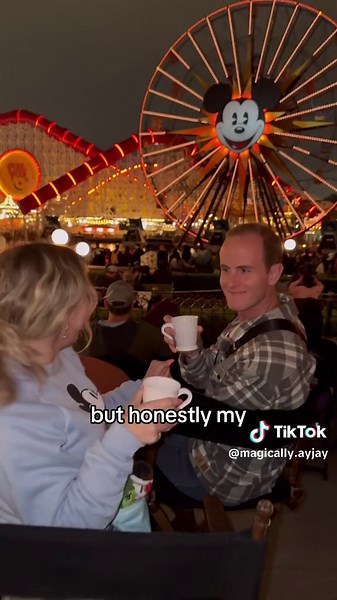 While it was pricey, the splurge was worth it for the hot coco and the seats! This view of Disneylands World of Color could not be beat #disneylandvlog #worldofcolor