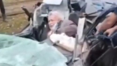 Russian tank runs over Ukrainian civilian car