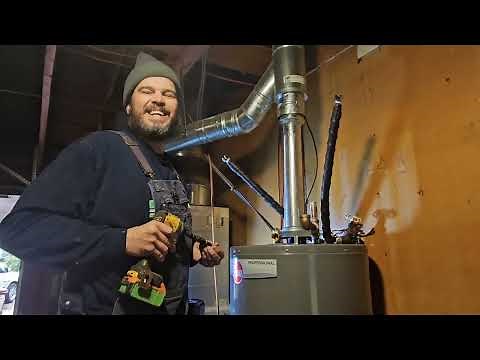 Gas Water Heater Install. Code requires gas burner and controls like to be min 18" above ground