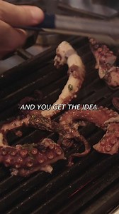 Since we covered Octopus 101 yesterday, I want to walk you through how to grill it today. Throw your octopus legs on a hot grill to get a smoky char and great texture. Pair it with a simple salad, a tart vinaigrette, and enjoy! The written recipe is linked in my bio. | Andrew Zimmern
