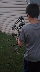 Liams first time Shooting his Compound Bow . It took him less then 30 mins to get it down . Hes a Natural with a Bow . #bowhunter | Naham King